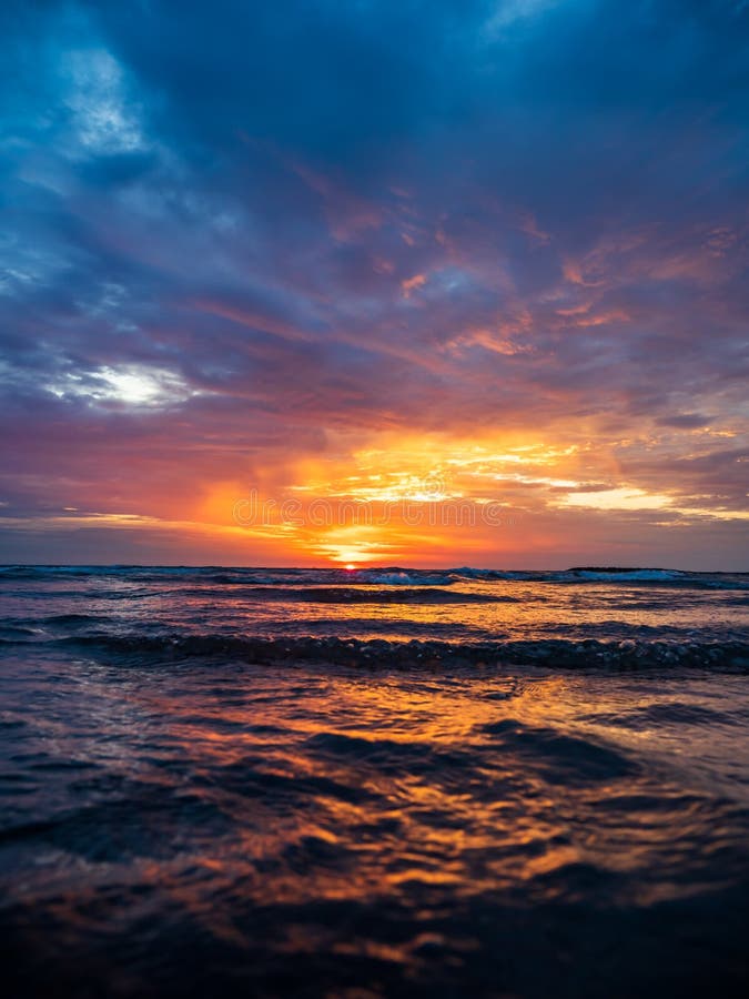Sunset on Kuta beach, Bali stock photo. Image of indonesia - 10406440
