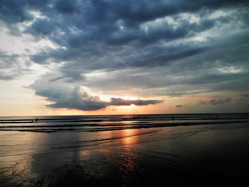 Sunset . Kuta Beach . Bali stock photo. Image of water - 97919528