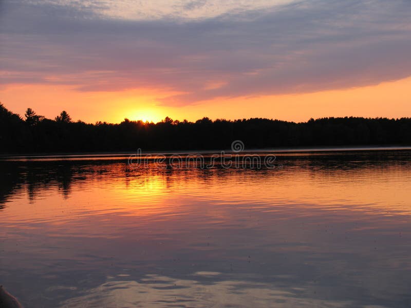 Sunset on Lake stock image. Image of lake, clouds, sunset - 1055229