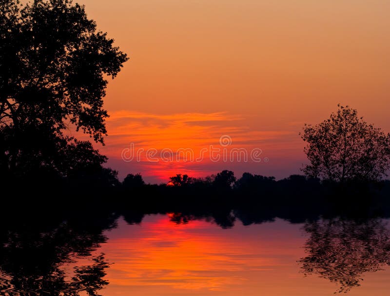 Sunset on lake stock photo. Image of scenic, river, beautiful - 11065284