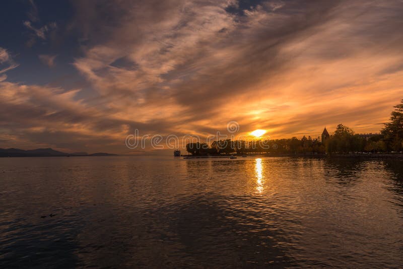 Sunset on Lake Geneva. Golden Hour Stock Photo - Image of purple ...