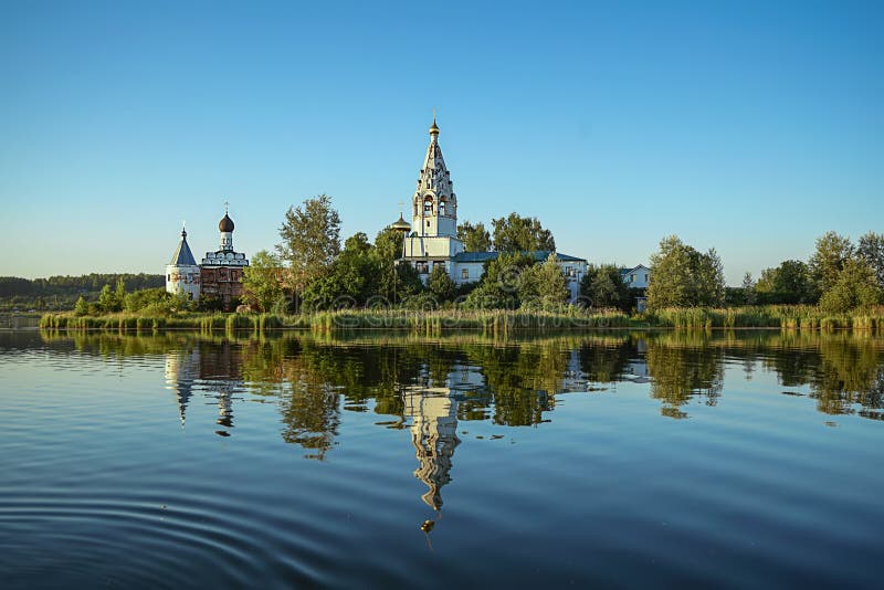 Sunset on the Lake. Monastery with Reflection in Blue Water Stock Photo ...