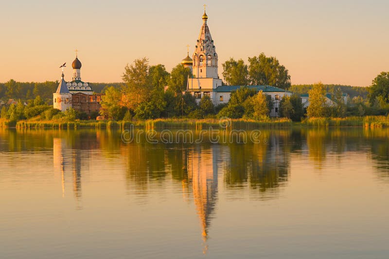 Sunset on the Lake. Monastery with Reflection in Water Stock Image ...