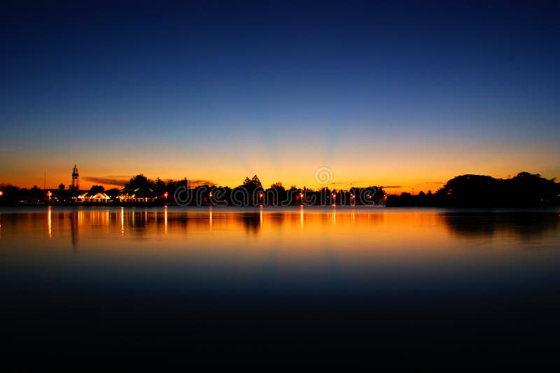 Sunset on lake stock photo. Image of nature, asia, sunlight - 47271084