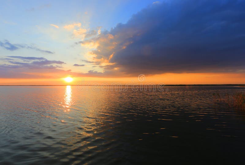 Red sunset on lake stock photo. Image of cloudy, sunrise - 12661050