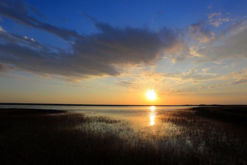 Red sunset on lake stock photo. Image of cloudy, sunrise - 12661050