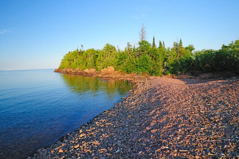 Sunset on the Lake shore stock photo. Image of grand - 20309974