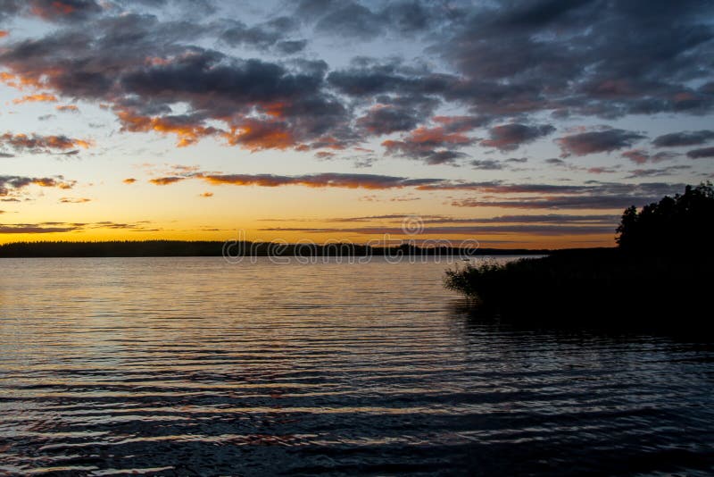 Sunset at the lake Unden stock image. Image of nature - 245972329