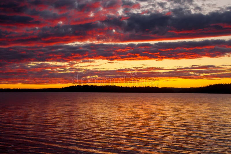 Sunset at the lake Unden stock image. Image of destination - 245972347