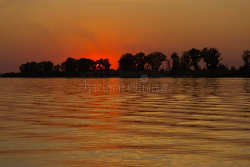 Sunset on the lake stock image. Image of sunrise, outdoor - 133111649