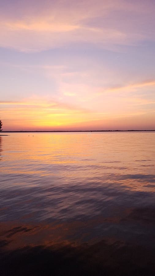 Sunset on the lake stock photo. Image of water, lake - 154240126