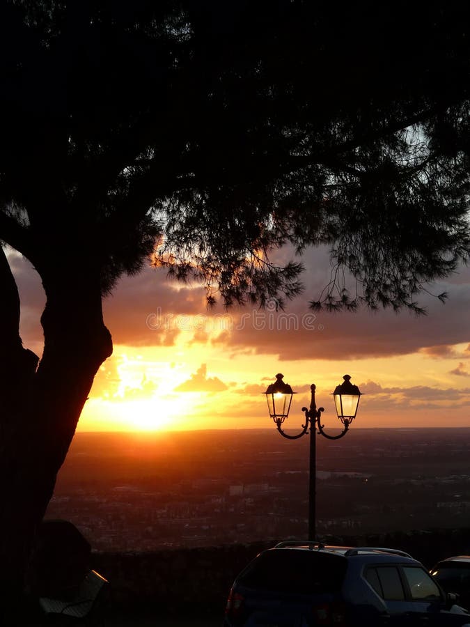 Sunset with lamp stock photo. Image of sunset, romantic - 137118596