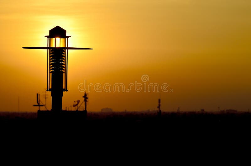 Sunset and a Lamp Post stock image. Image of gold, illumination - 27466687