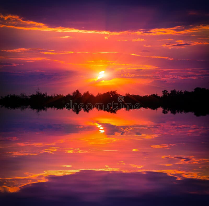 Sunset on lake stock image. Image of color, light, twilight - 121494787
