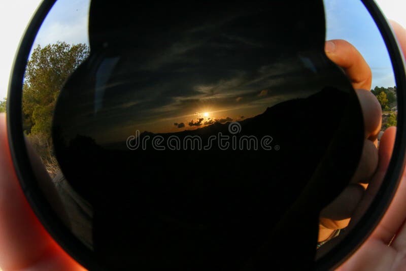 Sunset Landscape Reflected in the Wide Angle Lens Stock Image - Image ...