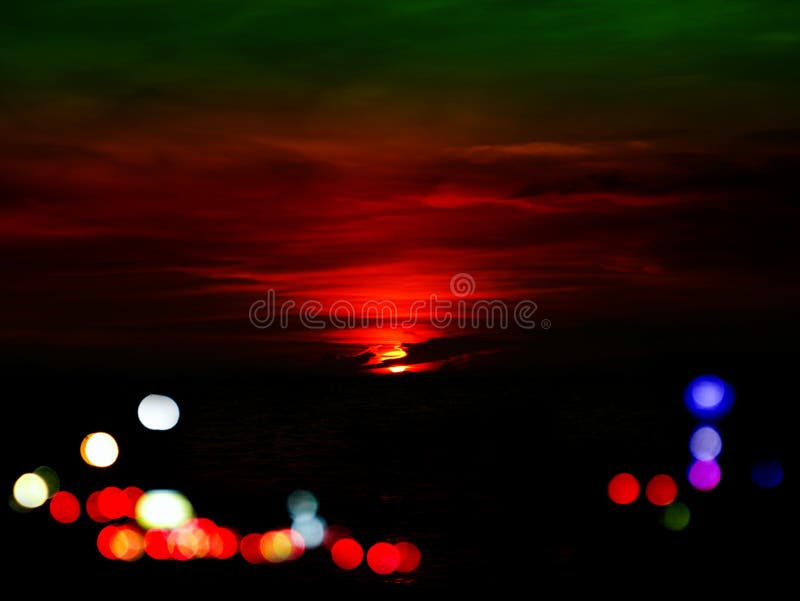 Sunset Last on Horizontal Line and Blur Light Ship Over Night Ocean ...