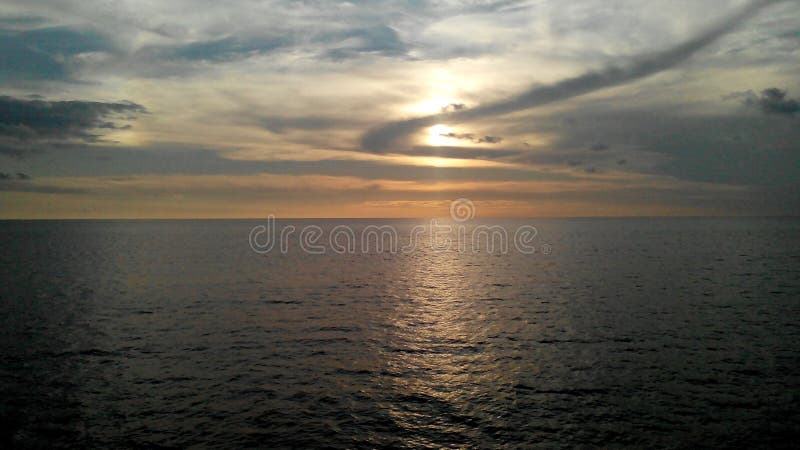 Sunset stock photo. Image of laut, sunset, sawu, liburan - 65488668