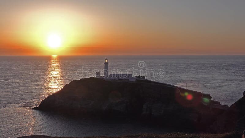 Sunset with Lens Flare at South Stack Lighthouse - Anglesey , Wales ...