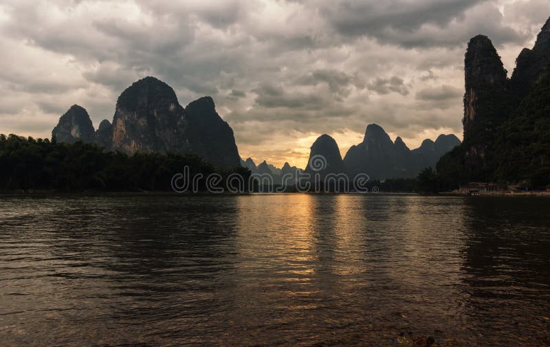 Sunset on Li river, China. stock image. Image of nature - 99493923