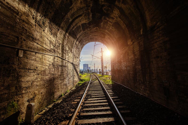 Sunset Light at the End of Railroad Tunnel Stock Image - Image of arch ...