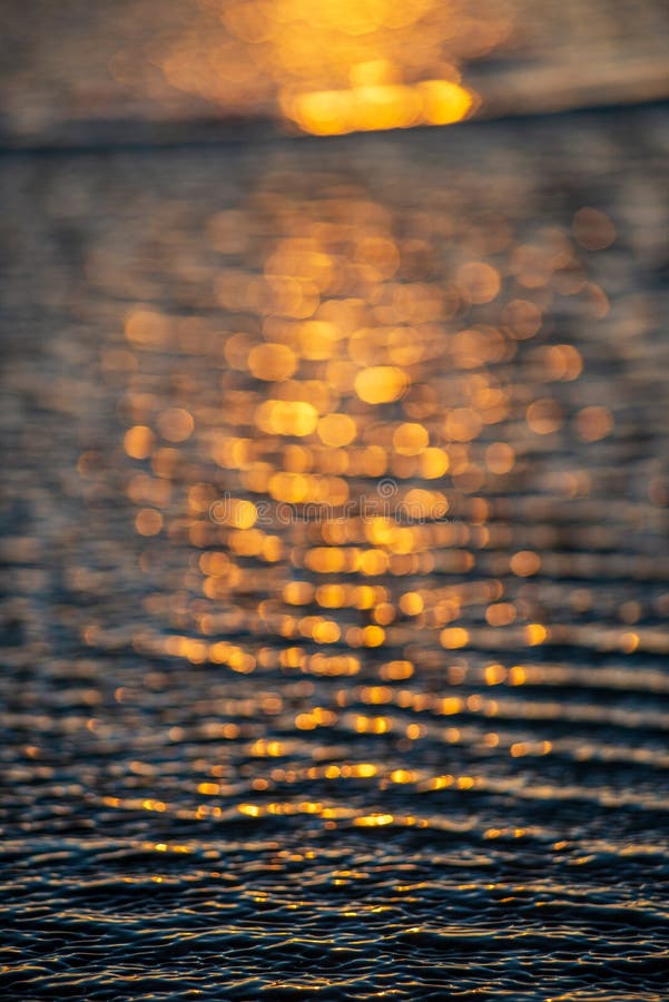 Sunset Light Reflection in the Beach Wet Sand and Water Stock Photo ...
