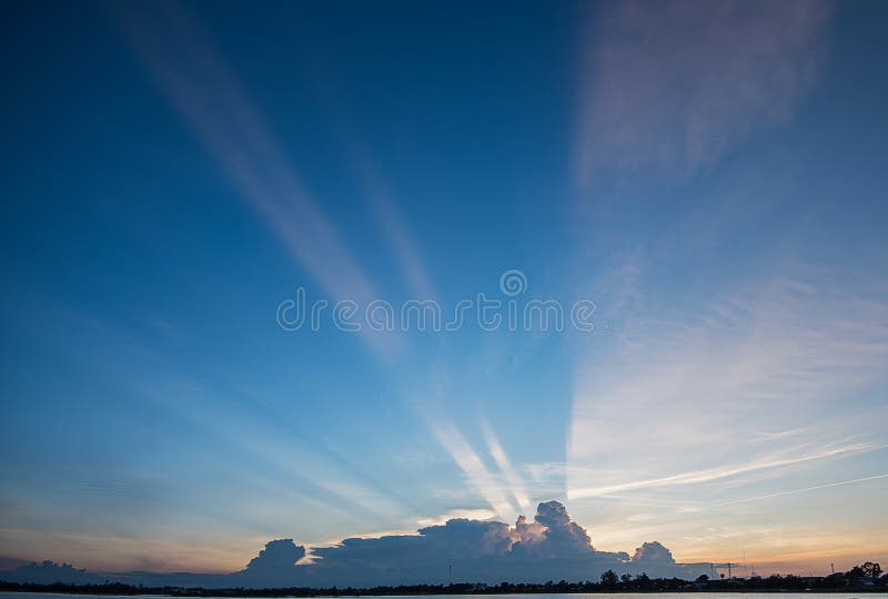 Sunset with Light Streaks and Half of Sky Lit by Setting Sun Stock ...