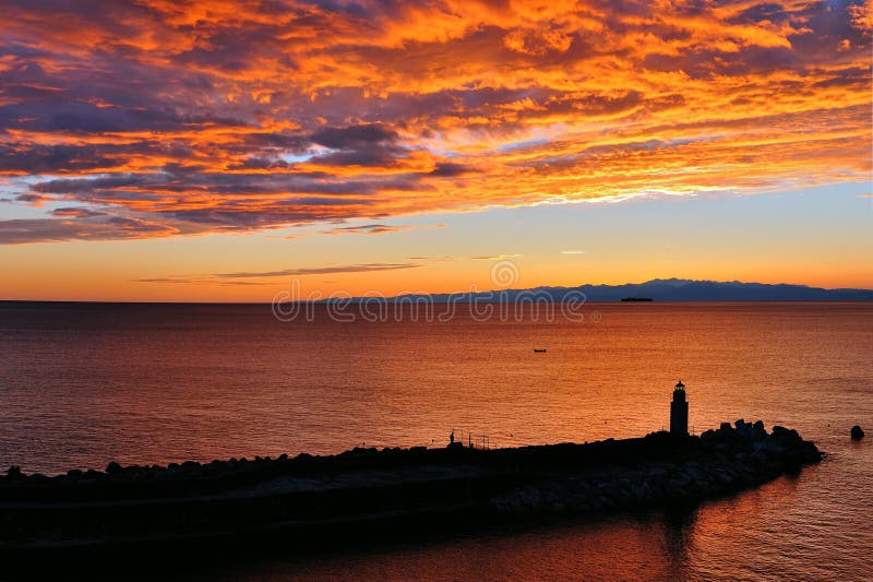 Sunset Lighthouse with Beautiful Sky Stock Photo - Image of graphically ...