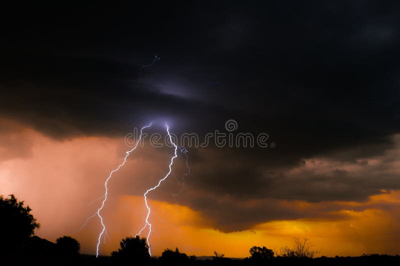 Electric Lights and Lightning Over Residential Rooftops Stock Photo ...