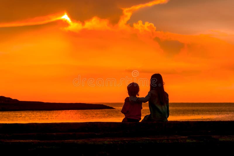 Sunset Silhouette Of Little Brother And Sister Stock Image - Image of ...