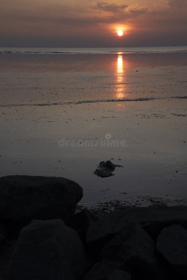Sunset during Low-tide at the Beach. Stock Image - Image of evening ...