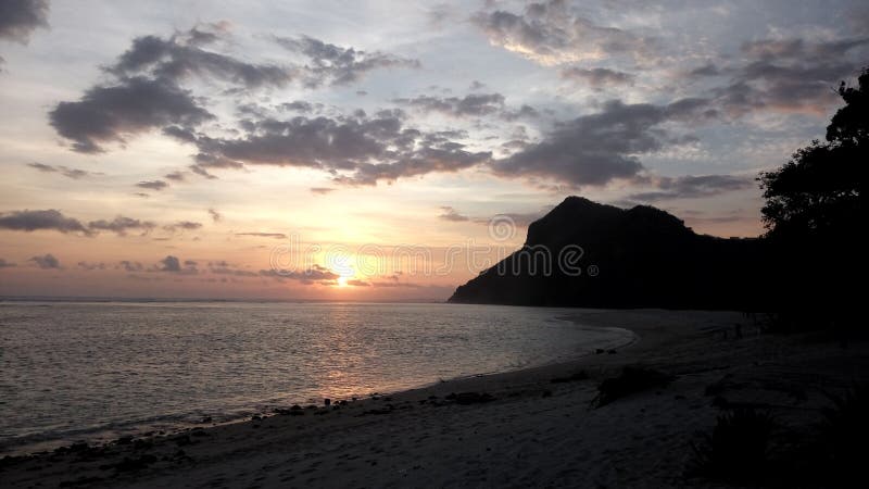 Sunset in Maluk beach stock image. Image of ocean, sumbawa - 273819311