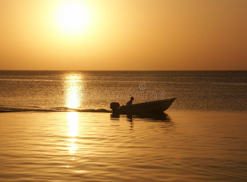 22,734 Man Boat Sunset Stock Photos - Free & Royalty-Free Stock Photos ...