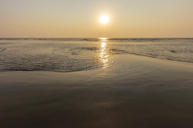 Sunset on Mandrem Beach in Goa, India Stock Photo - Image of tourism ...