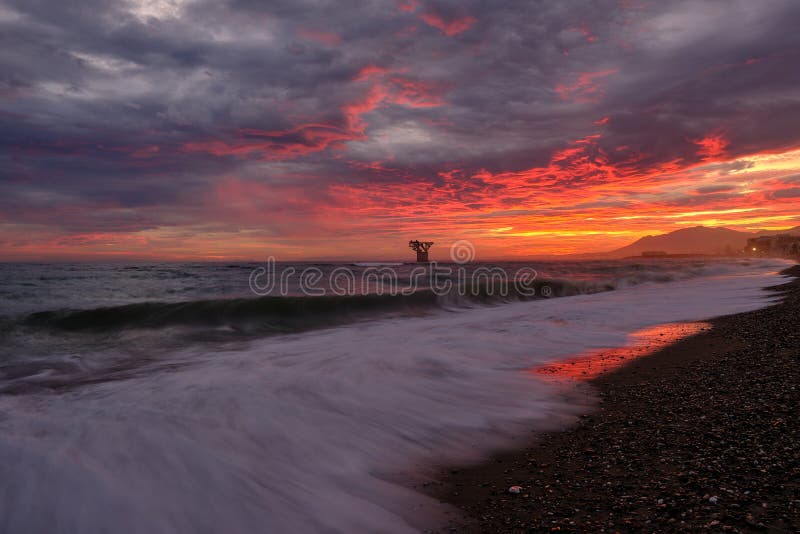 Sunset in Marbella at the Shore Stock Image - Image of sunrise, beach ...