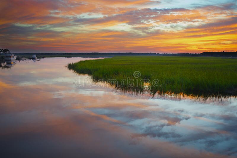 Sunset on the Marsh stock image. Image of smooth, reflected - 6757593