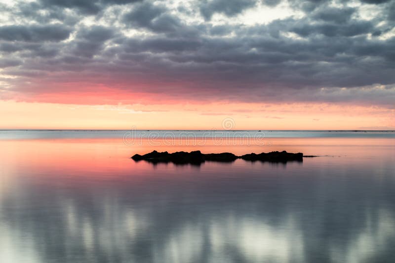 Sunset in Mauritius stock image. Image of reflection - 77353637