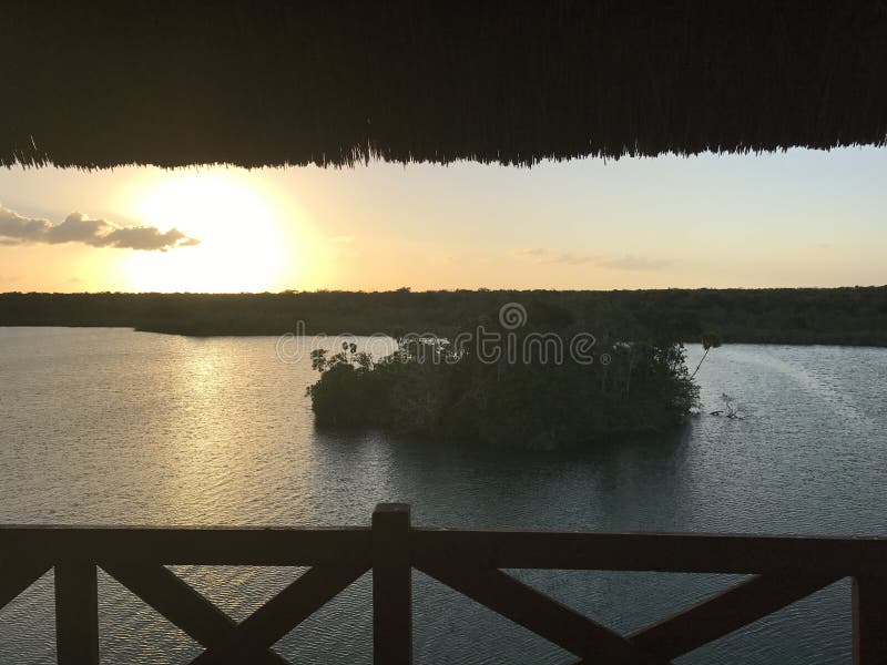 Sunset in the Middle of a Lagoon from a Hut Stock Photo - Image of ...