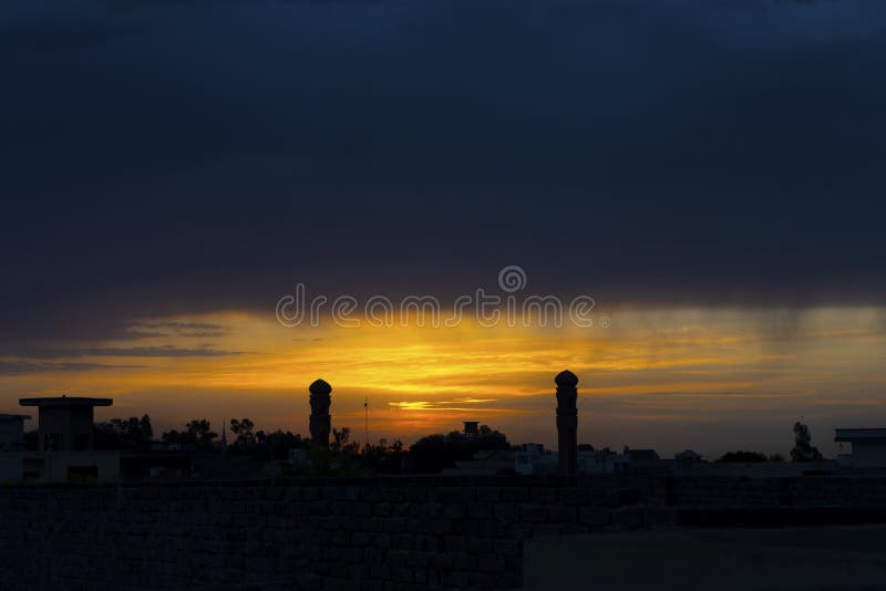 Sunset with Minaret with Golden Light and Clouds Stock Photo - Image of ...