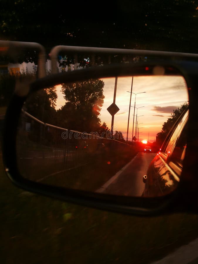 Sunset in mirror stock photo. Image of tree, mirror - 251477188