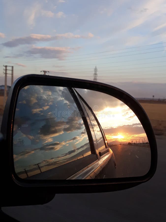 Sunset in mirror stock photo. Image of mirrorclouds - 179385290