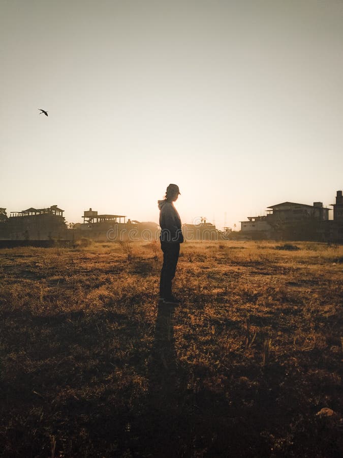 Sunset with a model stock photo. Image of golden, model - 163476542