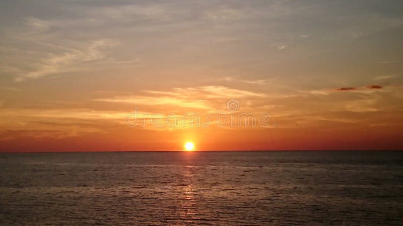 Long beach Sunset stock photo. Image of sunset, moment - 110193532