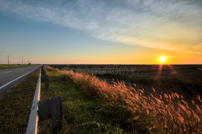 Sunset moment at side road stock image. Image of bright - 48960393