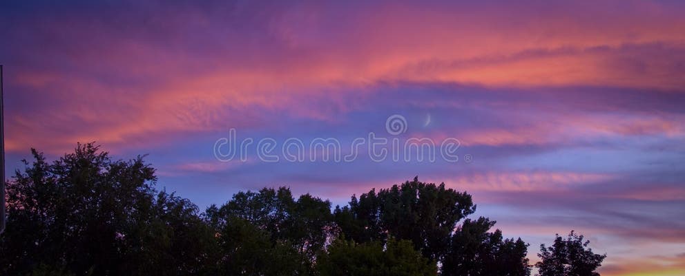 Sunset with moon stock image. Image of color, peaceful - 7472995