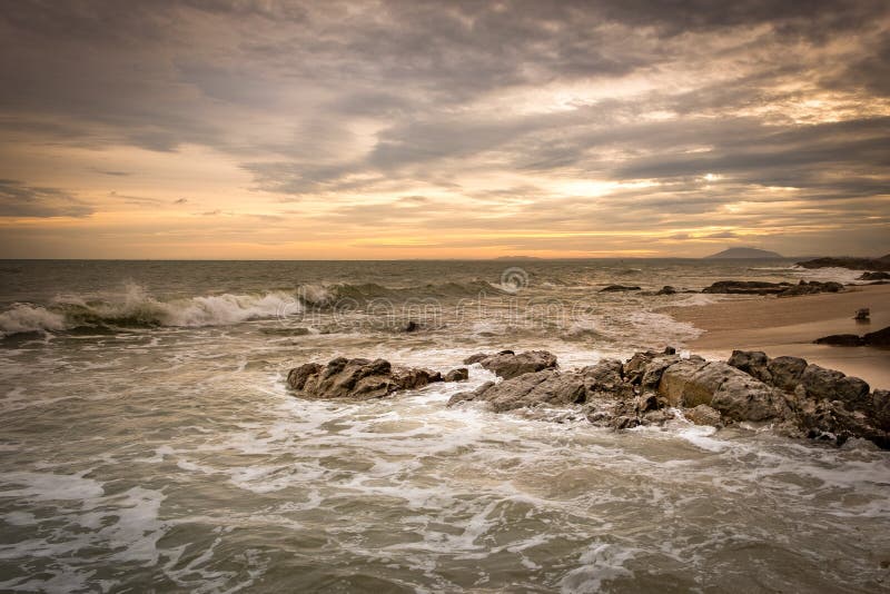 Sunset on Mui Ne beach stock image. Image of sunset - 135870849