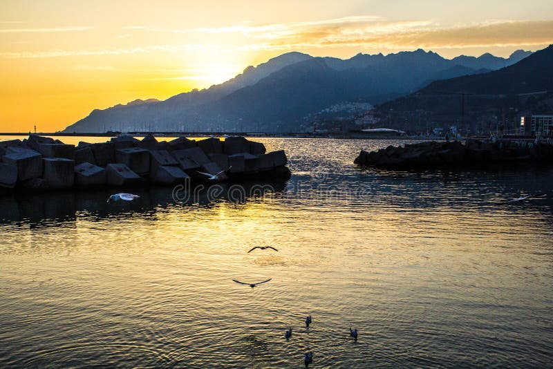 Sunset in Napoli Italy stock photo. Image of setting - 62716156