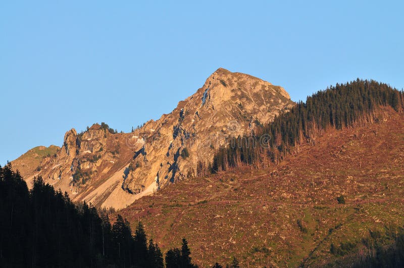 Sunset near Zweisimmen stock image. Image of mountain - 11507081