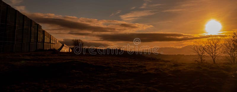 Sunset with a Nice Building on the Left Stock Photo - Image of sunrise ...