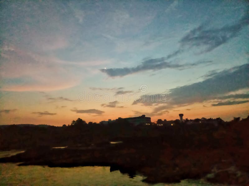 Sunset in the night mode stock photo. Image of world - 188585940