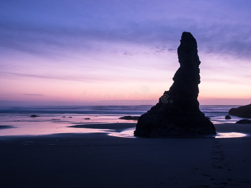 Sunset on Ocean Beach with Cliffs Stock Photo - Image of ocean, rocky ...